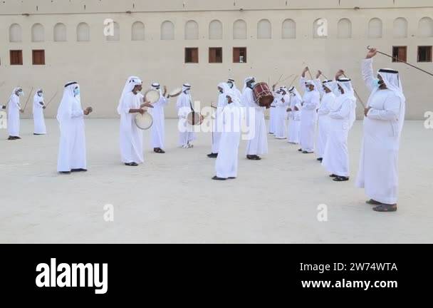 ABU DHABI, UAE - MAY 15, 2021: Traditional Emirati male Al Ayala dance ...