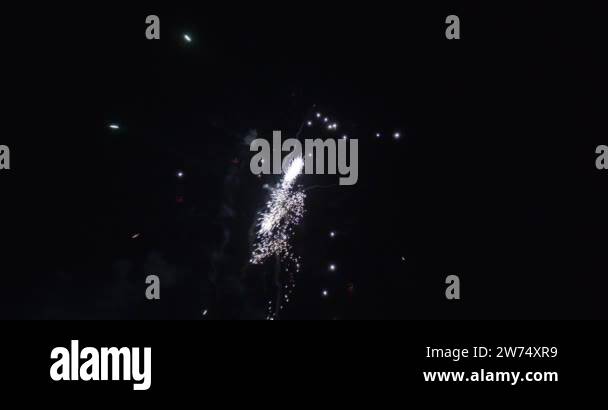 swirling Roman candle effect fireworks white red and green in real-time ...
