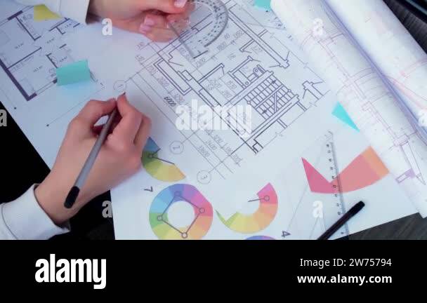 Hands use pencil with a protractor. Architectural Project drawings with ...