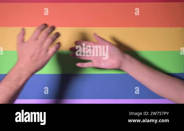Hand fist with lgbt flag background. Lgbt pride concept. Gender ...