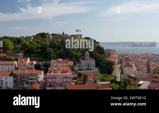 Elevated view of medieval Saint George Castle above historic houses in ...
