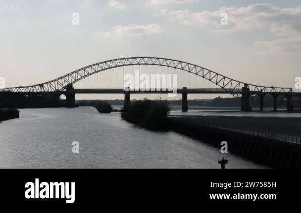 Short train entering the frame from right and going onto the railway ...