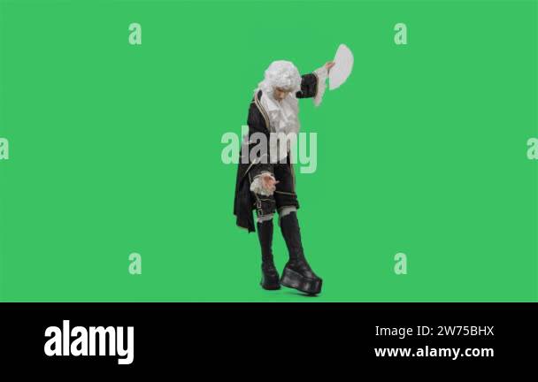 Portrait of courtier gentleman in black historical vintage suit and ...