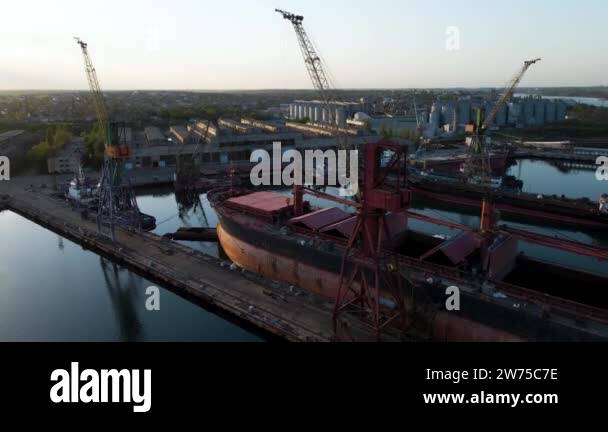 4K modern industrial port with containers from top or bird's eye view ...