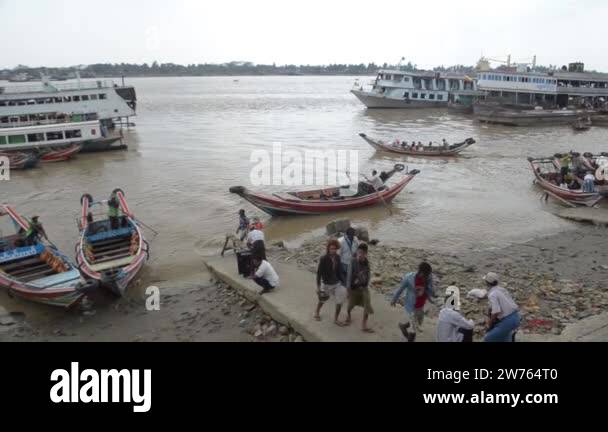 PORT, QUAY & JETTY: ASIA - Two passenger boats cross a jetty at port ...