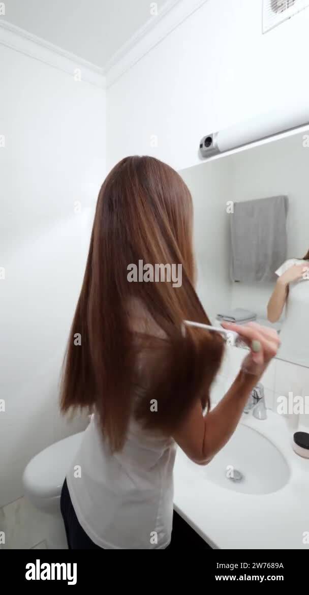 Woman young very long hair combing Stock Videos & Footage - HD and 4K ...