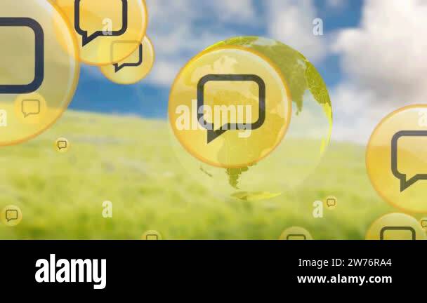 Animation of yellow message icons and globe spinning over landscape ...