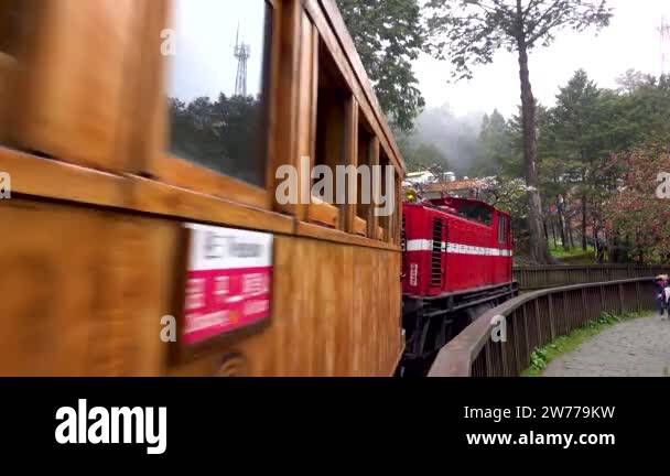 The hiking train in the forest park. It has a red locomotive.Train ...