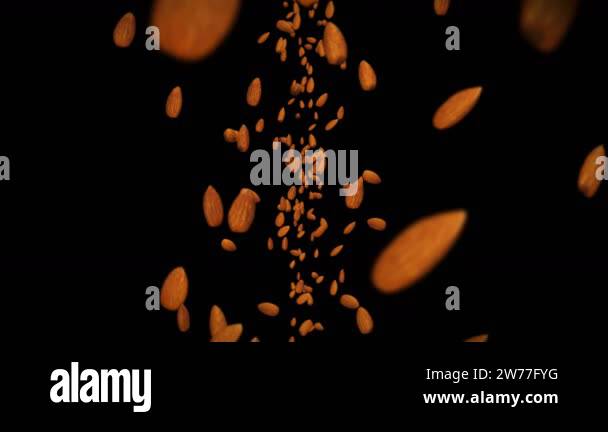Flying many almonds nuts on black background. Foodstuff, Healthy food ...