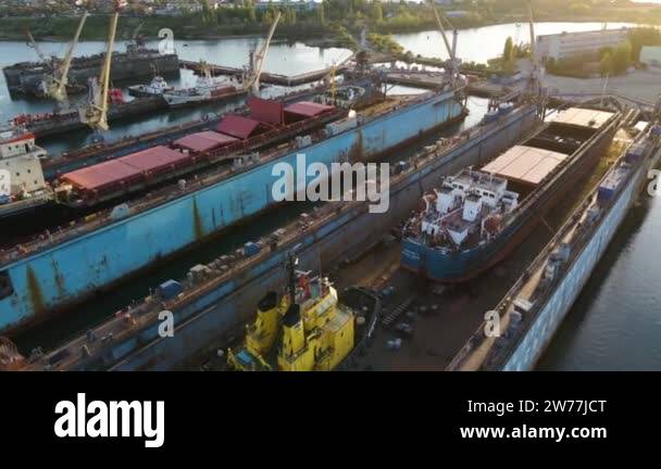 4K modern industrial port with containers from top or bird's eye view ...