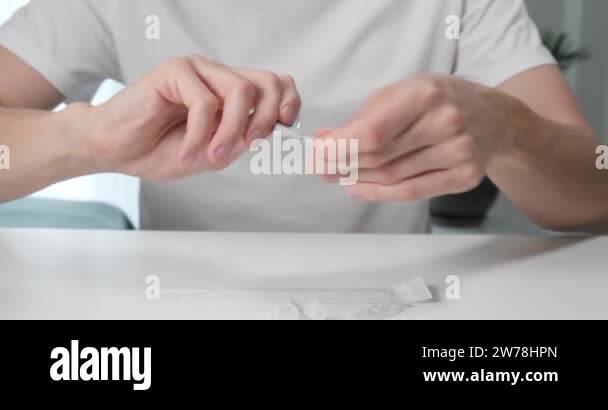 Thessaloniki, Greece - June 1, 2021: Man unpacking Covid-19 rapid ...