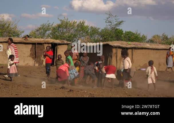 Maasai children playing in dust Stock Video Footage - Alamy
