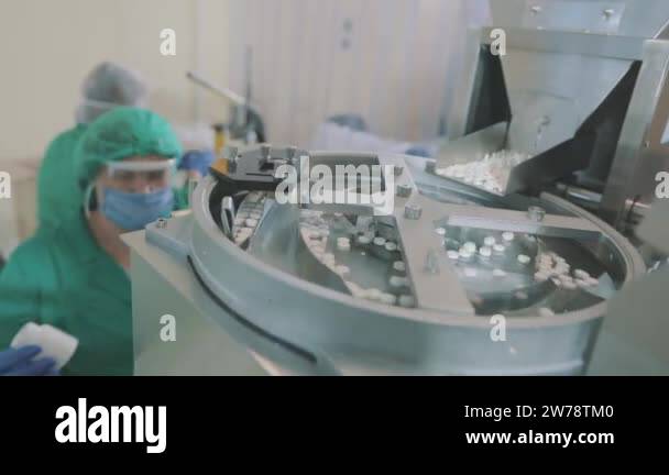 Conveyor line with tablets. The manufacturing process of drugs in a ...