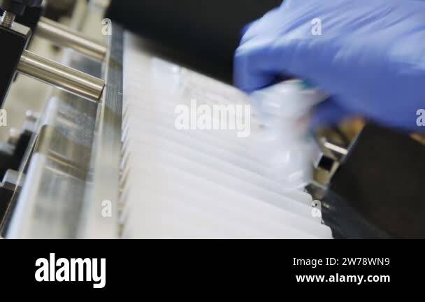 Automated manufacturing of Covid-19 test tubes in a clean room Stock ...