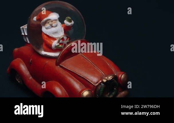 The perfect frame of a toy that represents Santa Claus carrying gifts ...