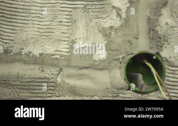 Internal socket for a socket in a concrete wall with protruding wires ...