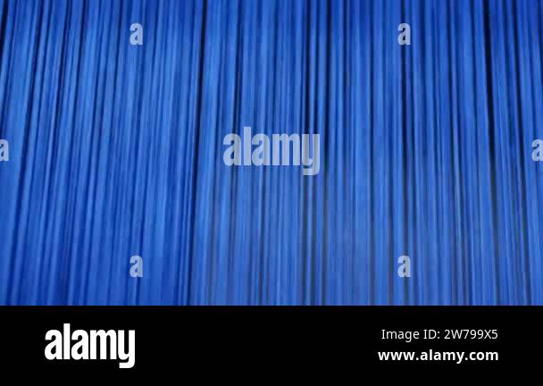 Multiple blue threads during weaving. Textile production, textile ...