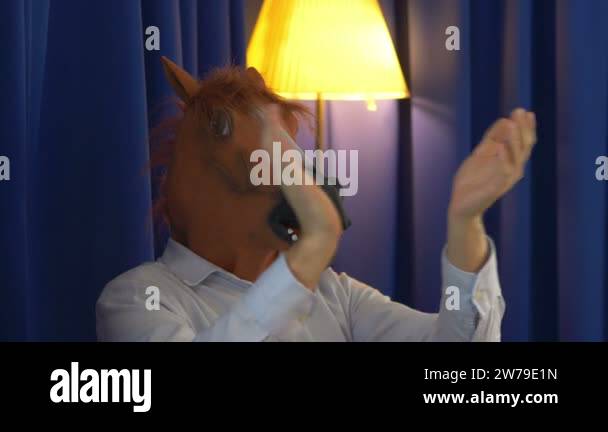 Man in a horse mask clapping hands in 4k slow motion 60fps Stock Video ...