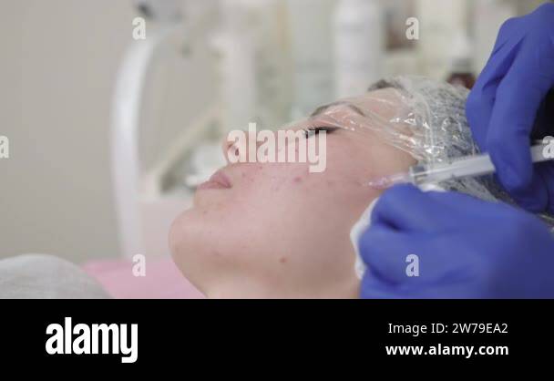 Close-up shot. Skin revitalization and mesotherapy. Female doctor ...