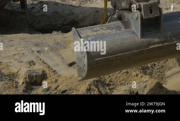 Digging And Earthing The Trench by Excavator on the Sity Street Stock ...