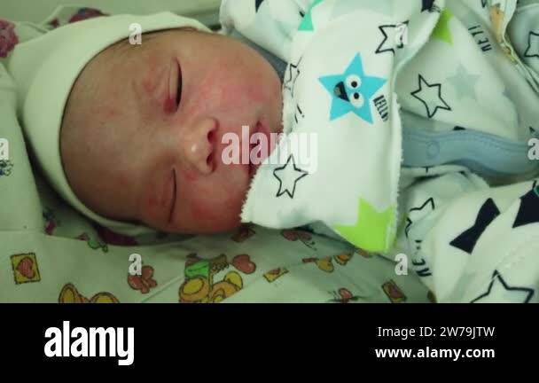 Newborn baby in maternity hospital. The baby was just born and he was ...