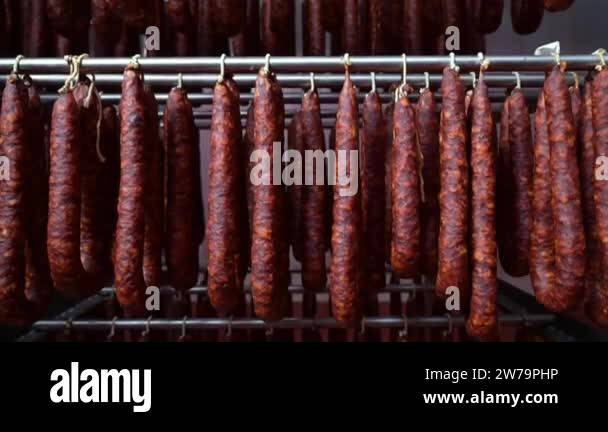 Close up view of typical Spanish dried sausage, Chorizo, hanging on ...