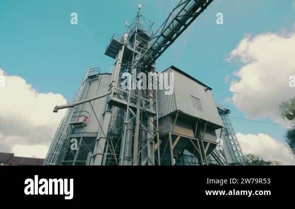 Steel grain silos for grain storage. Grain storage elevators Stock Video Footage - Alamy