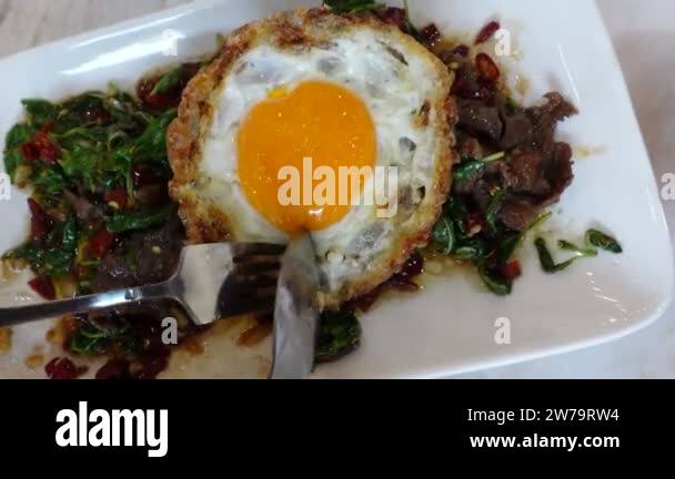 Runny yolk fried egg Stock Videos & Footage - HD and 4K Video Clips - Alamy