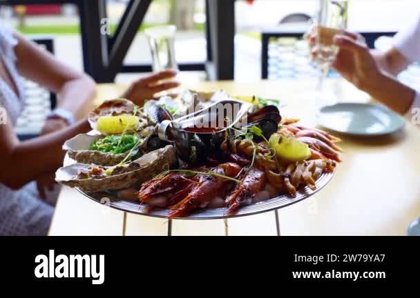 Mixed seafood salver, lobster shrimp, king prawns, mussels, oysters and ...