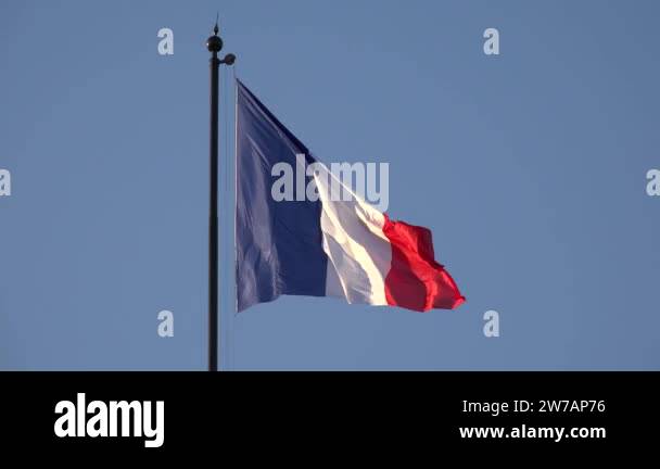 France Flag in Paris, French Banner Waving on Blue Sky at Sunset ...
