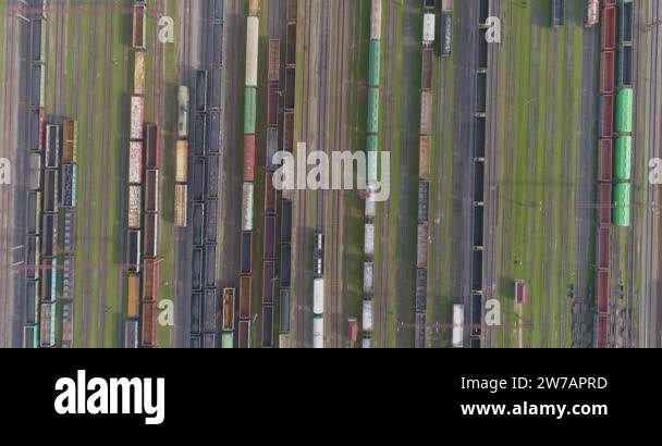 Flying over trains at the depot. Top view of freight trains at a ...