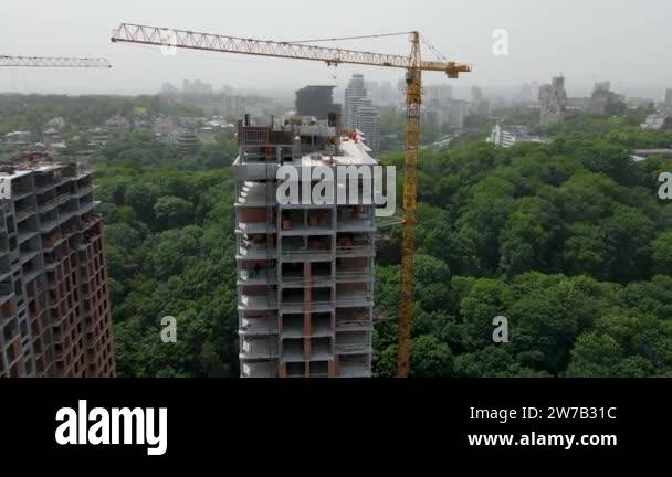 construction of a multi-storey residential building tower crane top ...