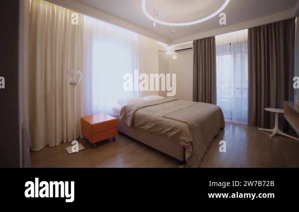 Beautiful modern empty hotel room interior. Video. View inside of clean ...