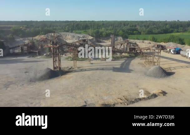 Conveyor belts and machinery at a gravel pit. Quarry for the extraction ...