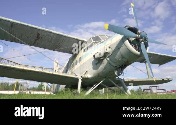 Close-up of cockpit fuselage of old USSR airplane standing in thick ...