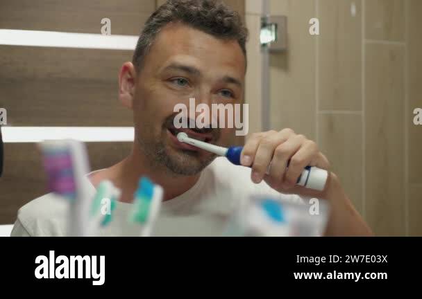 Handsome guy brushes teeth Stock Videos & Footage - HD and 4K Video ...