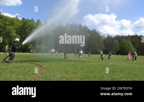 Man fire hose Stock Videos & Footage - HD and 4K Video Clips - Alamy