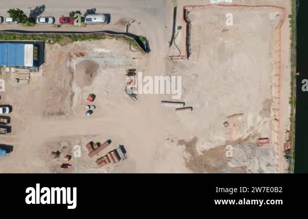 Aerial birds eye overhead top down view of construction site ...