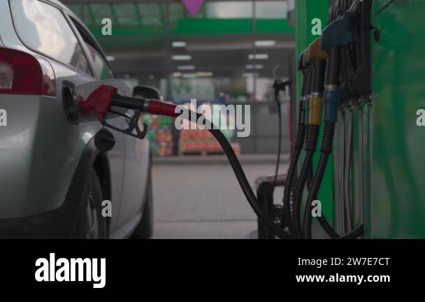 Refueling modern car at gas filling station close up. Filling car ...