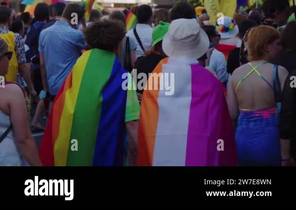 LGBTQ Rights In A Pride Parade - Back View Of People Wearing LGBTS ...
