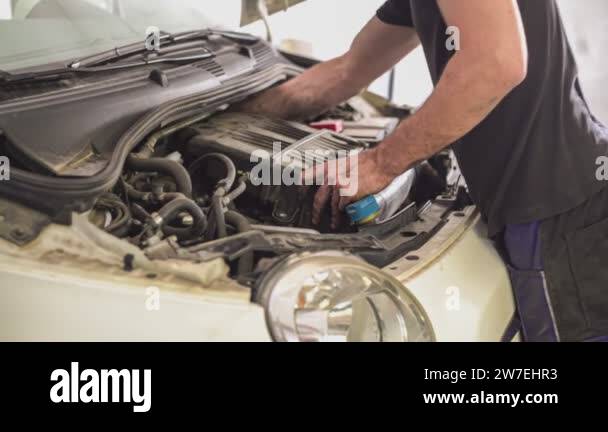 MILAN, ITALY 14 JULY 2021: Mechanic repair Detail of Engine powered by ...