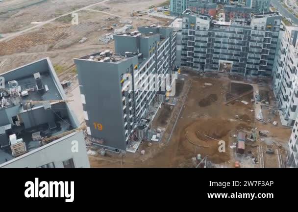 Aerial view of construction site, building work process modern an ...
