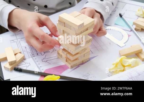 4k Architect designer Interior creative working hand playing block wood ...