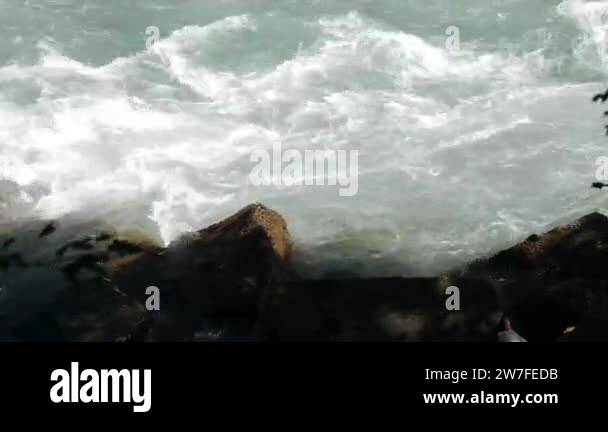 Wild furious mountain river flowing through stone boulders. Cold water ...