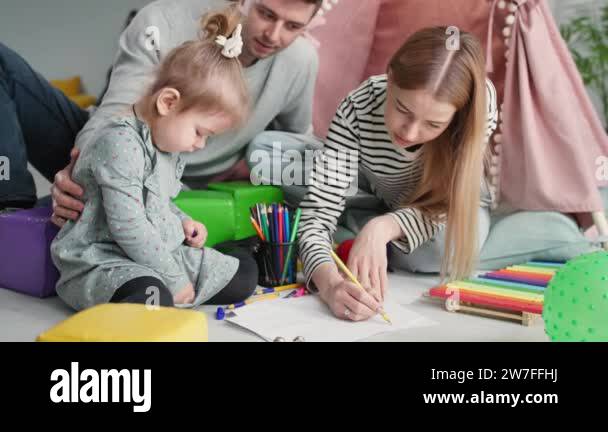 child development, caring parents spend time with their daughter and ...