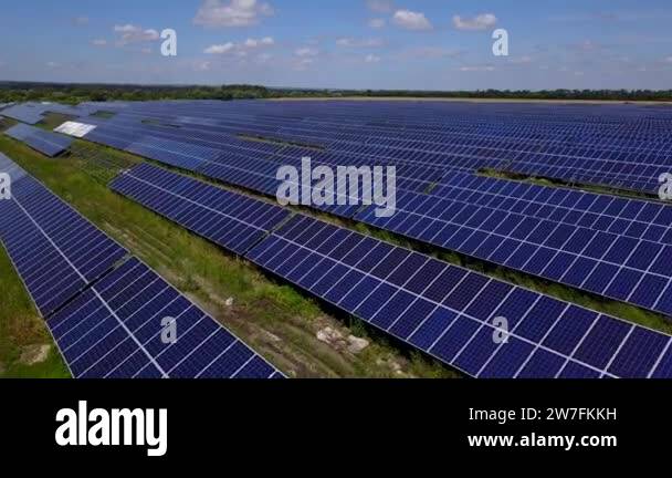 Aerial view of Solar Panels Farm with animation graphics of flowing ...