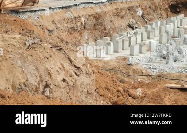 Installing piles, work in laying the foundation building on ...