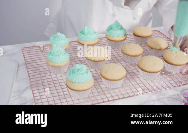 Wire cooling rack cupcakes buttercream frosting Stock Videos & Footage ...