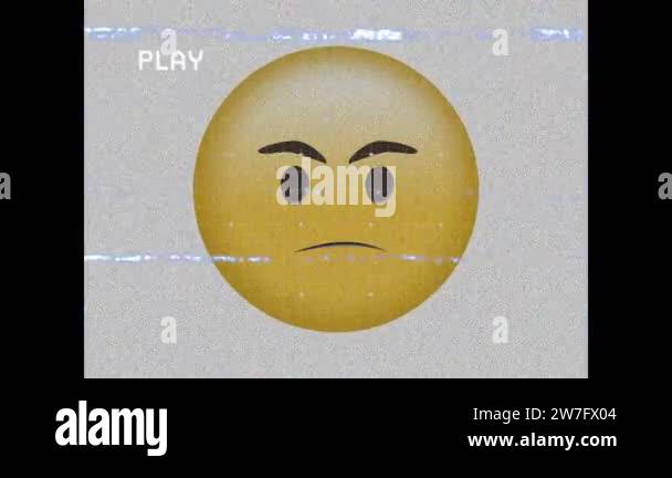 Digital animation of vhs effect over angry face emoji against grey ...