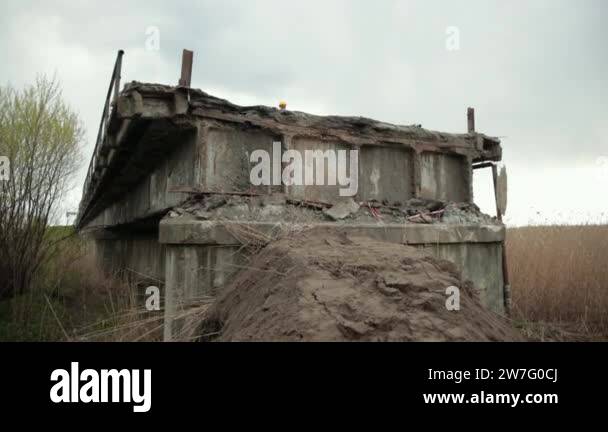 Bridge collapse. Destruction of structures across river with collapse ...